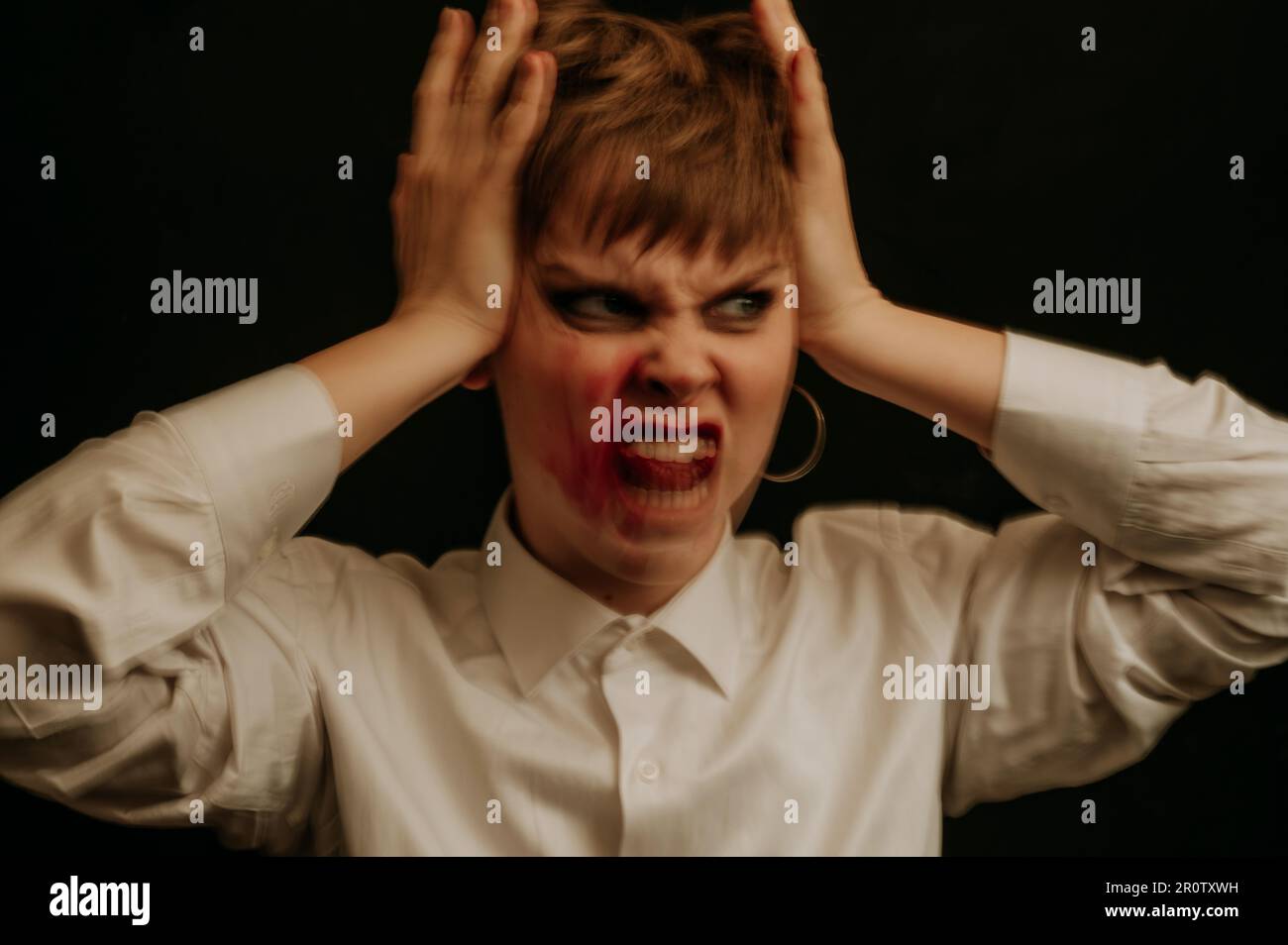 woman is a psychopath with schizophrenia and mental disorders. Portrait ...