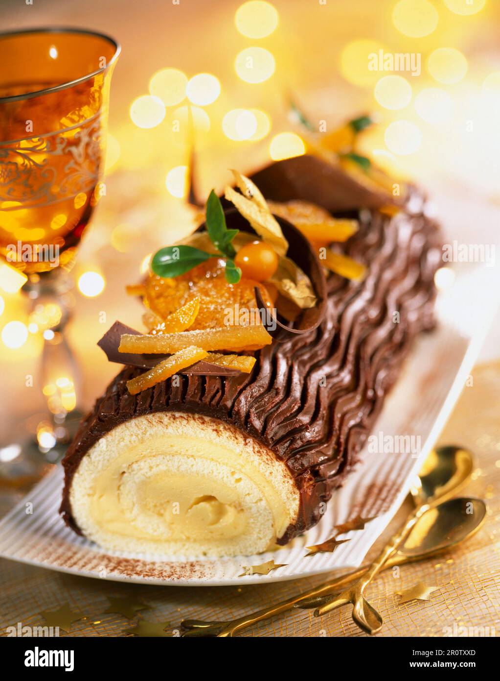 Chocolate-coated orange log cake Stock Photo - Alamy