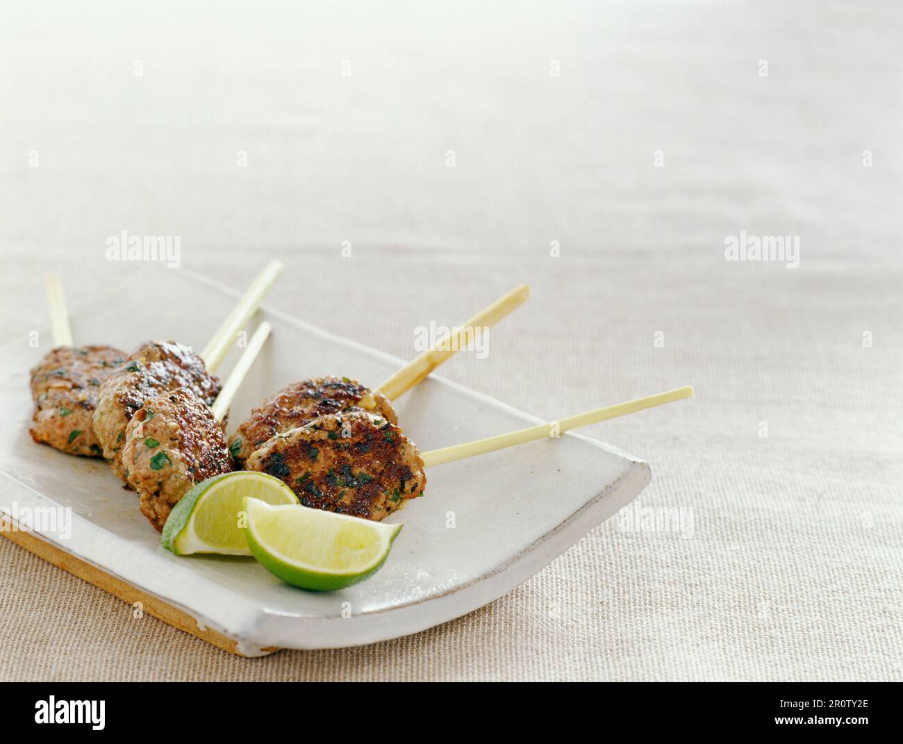 Cumin-flavored ground lamb brochettes Stock Photo - Alamy