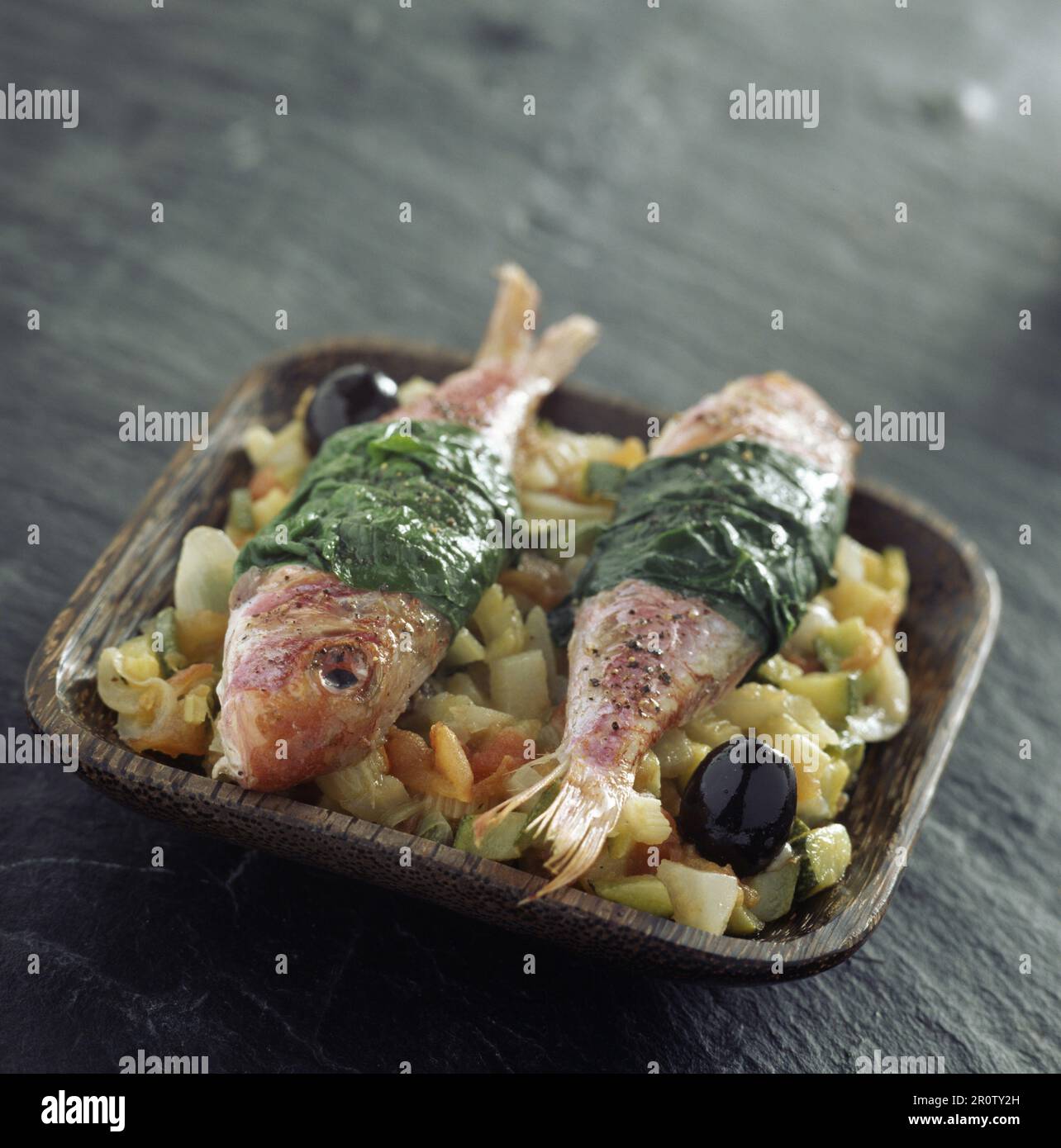 Red mullets with young vegetables Stock Photo - Alamy