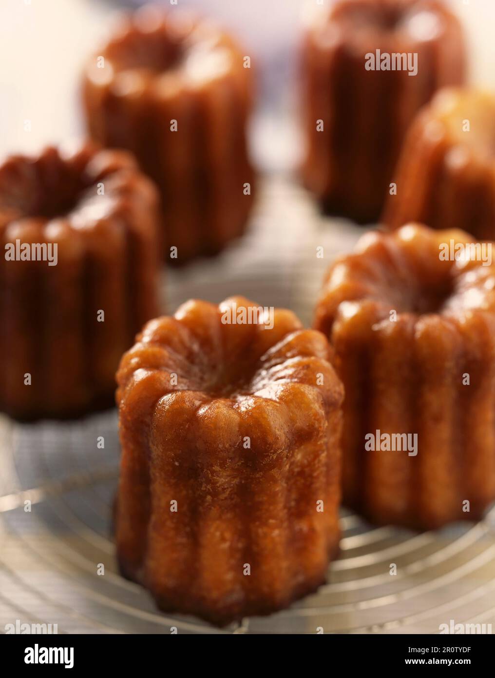 cannelé vanilla and rum caramelized cakes Stock Photo - Alamy