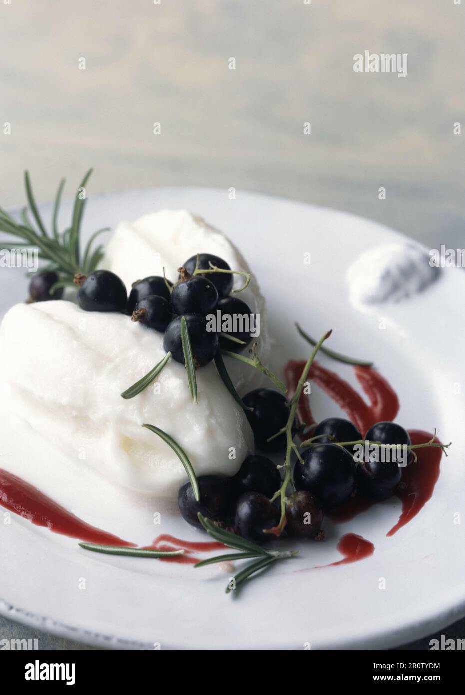 Goat cheese faisselle ice cream with blackcurrant coulis Stock Photo ...