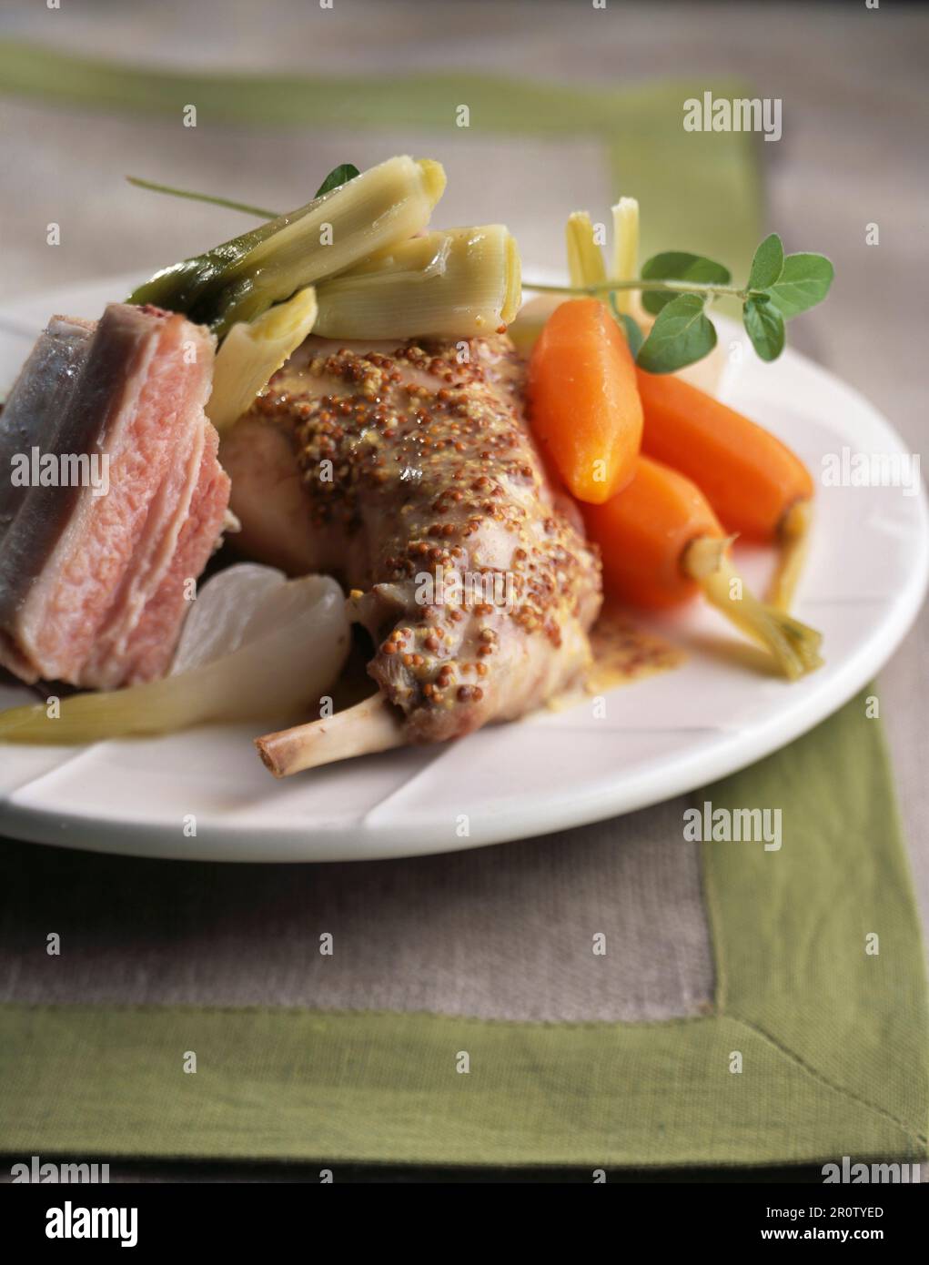 Mustard rabbit pot-au-feu Stock Photo - Alamy