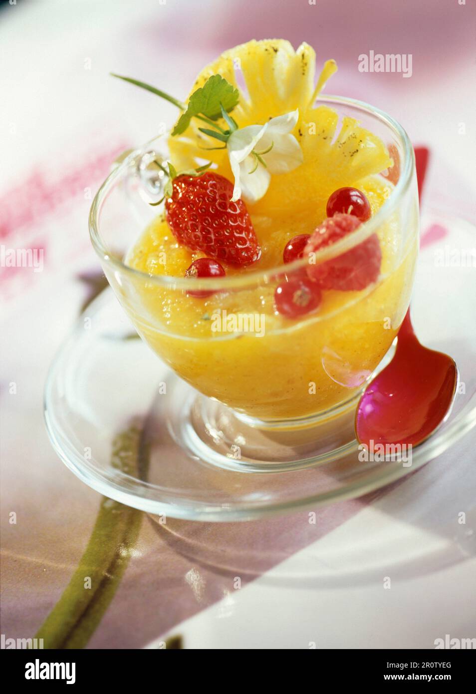 Stewed pineapple with summer fruit Stock Photo - Alamy