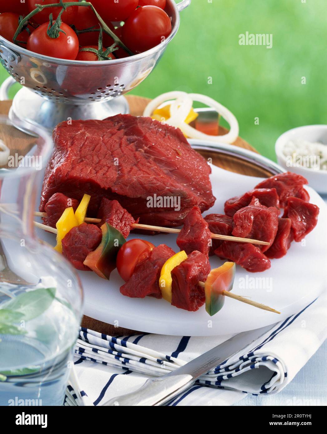 Selection of raw brochettes and steaks Stock Photo - Alamy