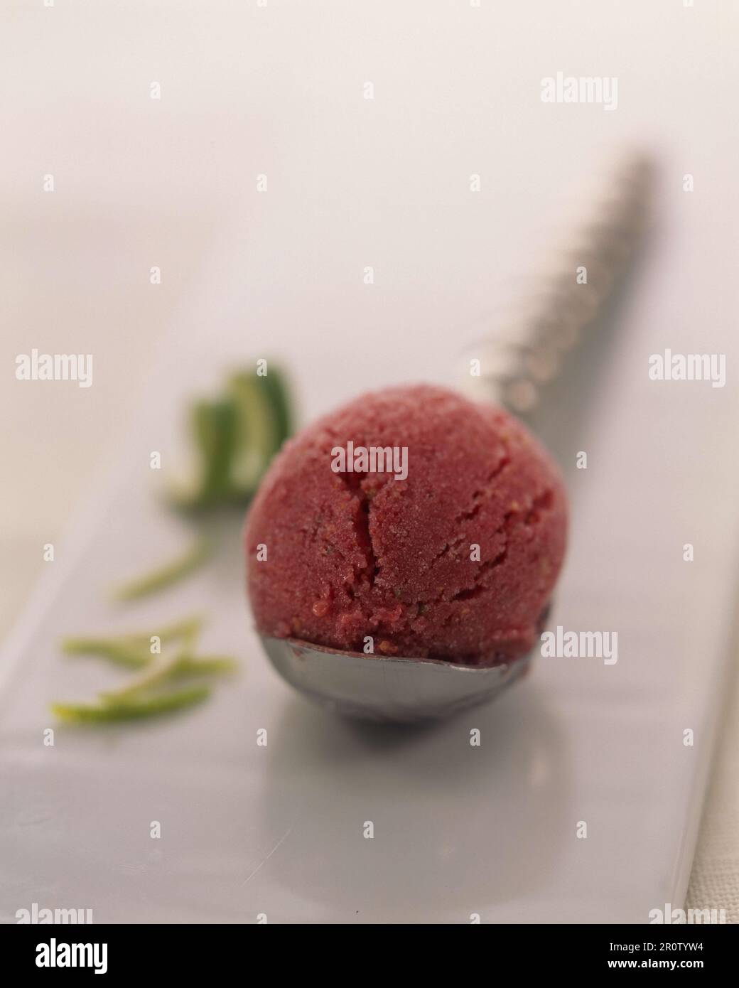 Scoop of strawberry and elderflower sorbet Stock Photo - Alamy