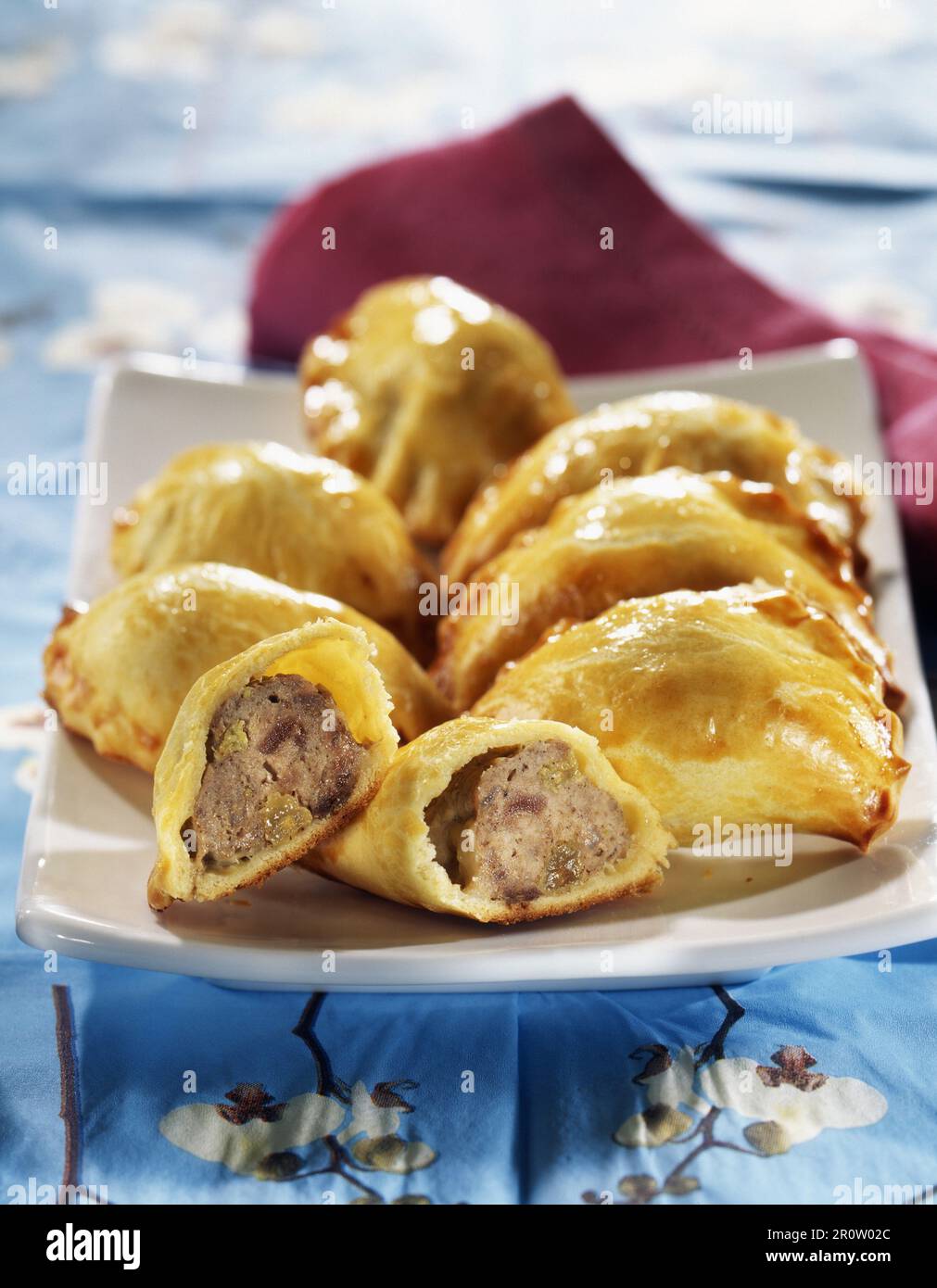 Sweet and sour meat turnovers Stock Photo - Alamy