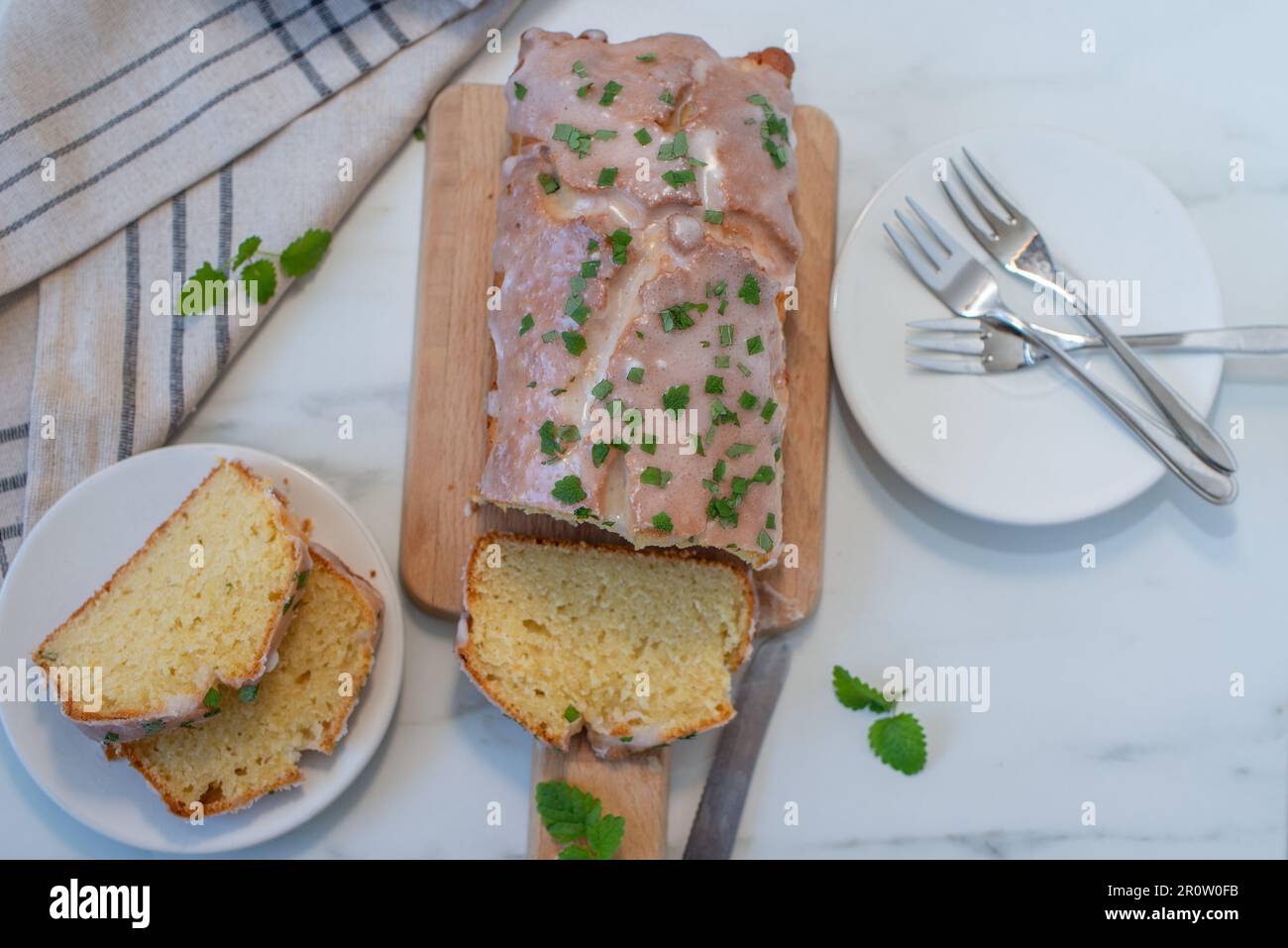 Lemon drizzle loaf cake, homemade sponge soft cake with sugar icing ...