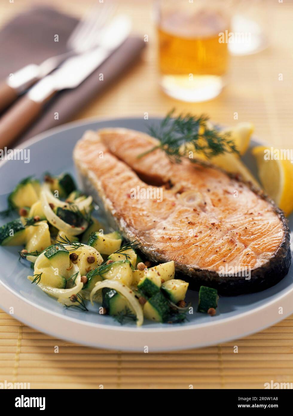 Salmon steak with courgettes Stock Photo - Alamy