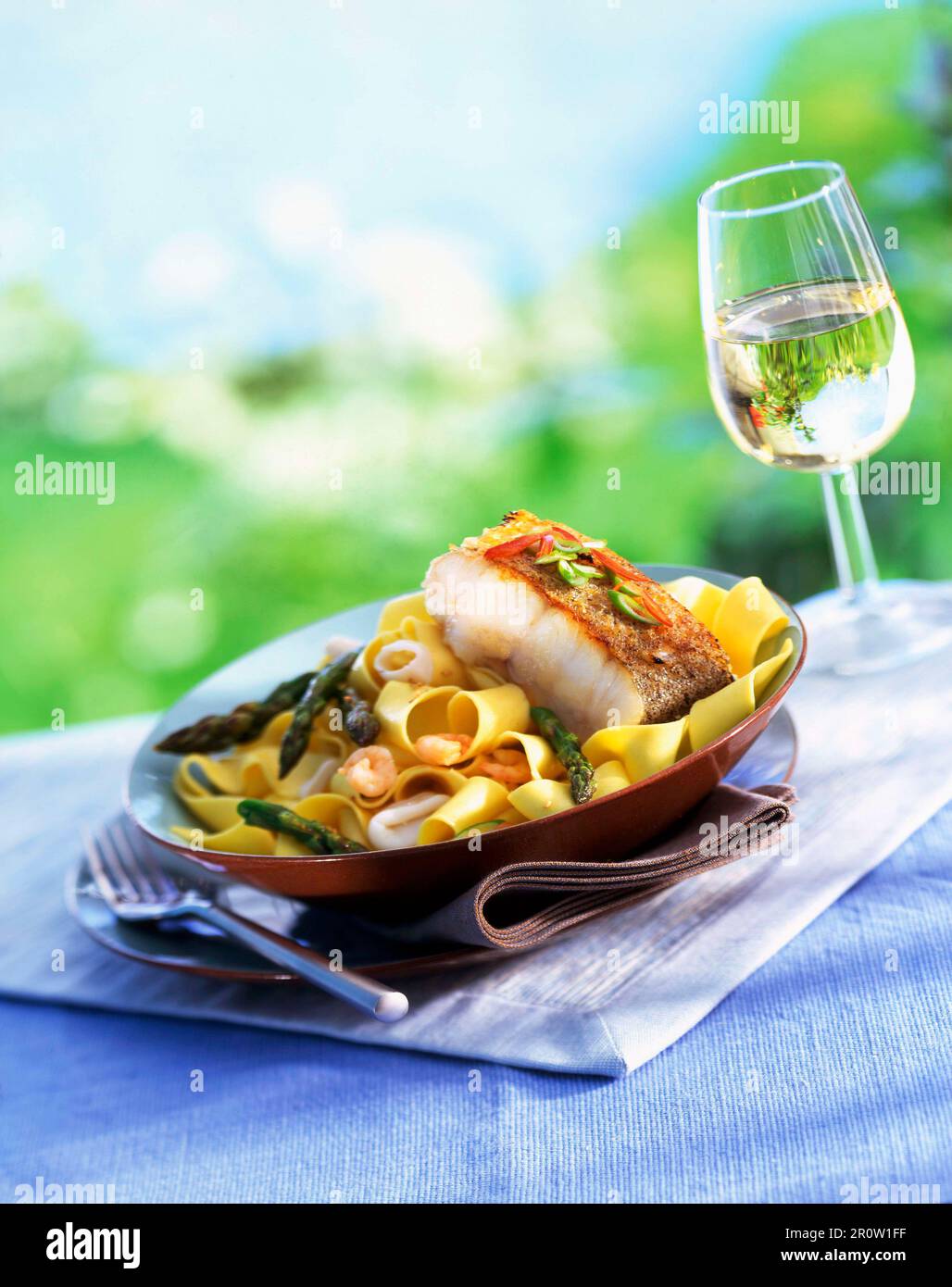Fillet of cod with pappardelle ribbon pasta Stock Photo - Alamy