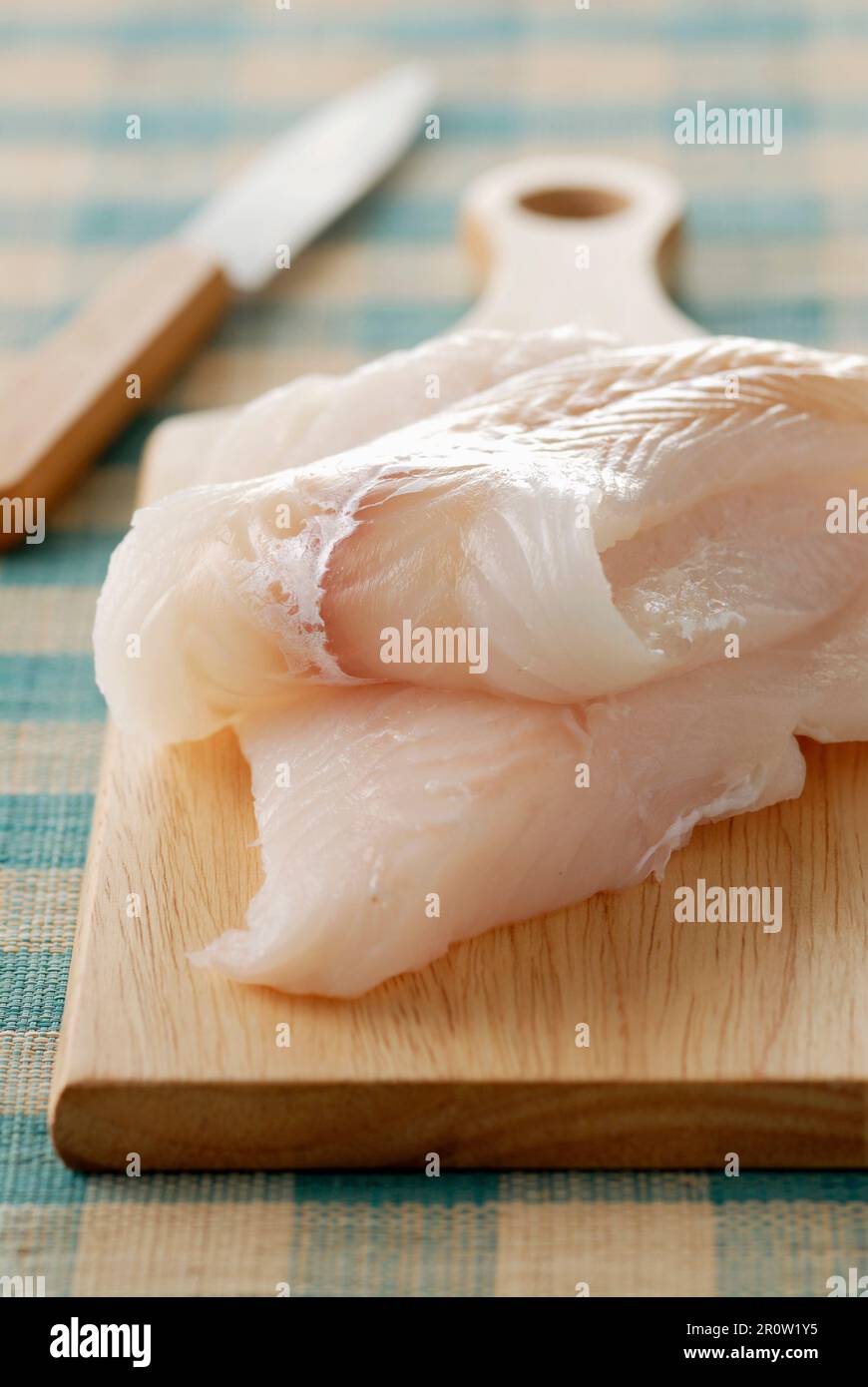 Raw cod fillets Stock Photo - Alamy