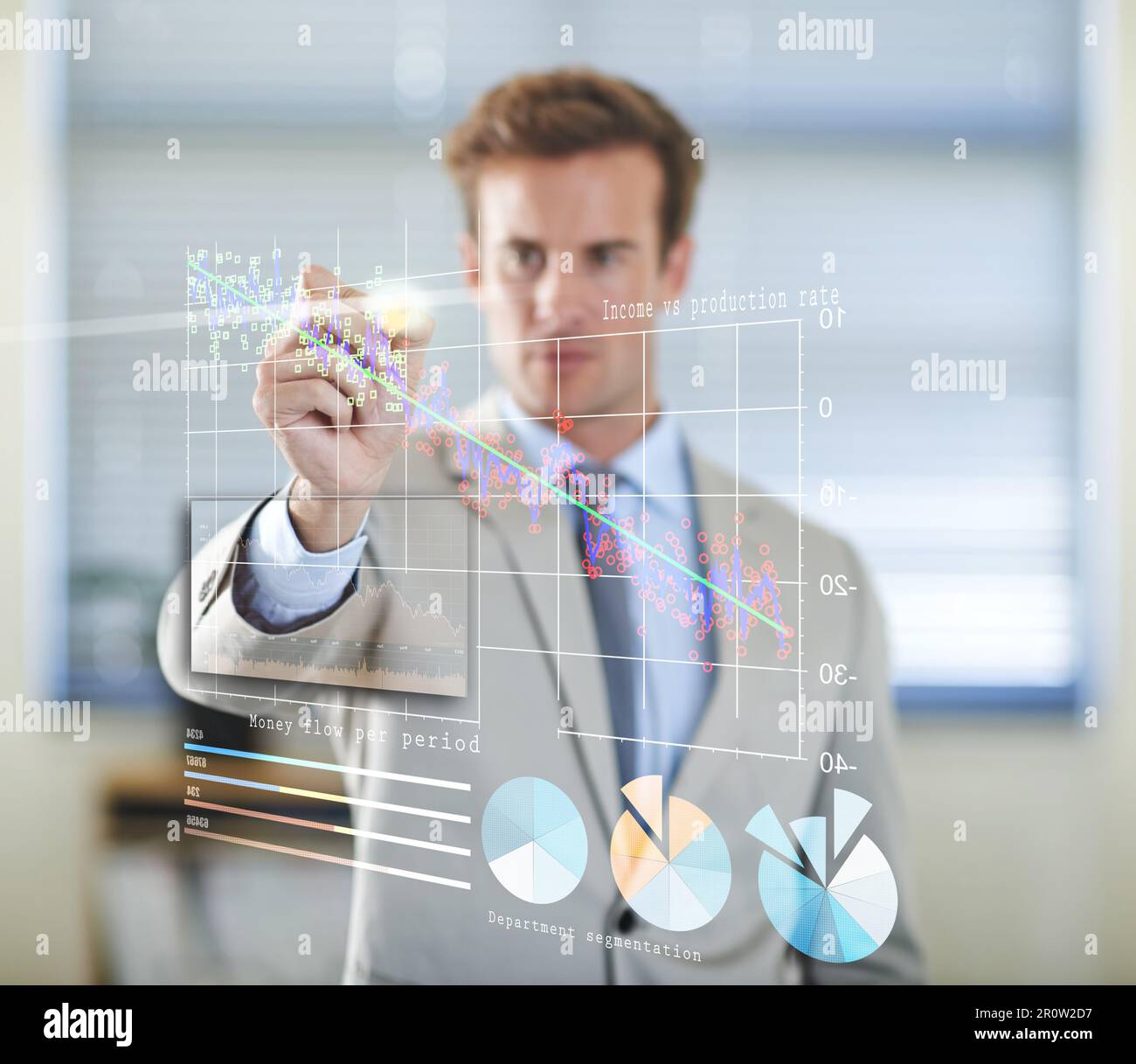 Future business trends. a handsome young businessman using a digital ...