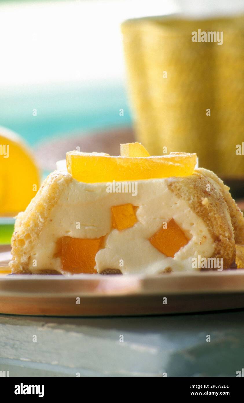 Provençal sponge roulade with candied melon Stock Photo - Alamy
