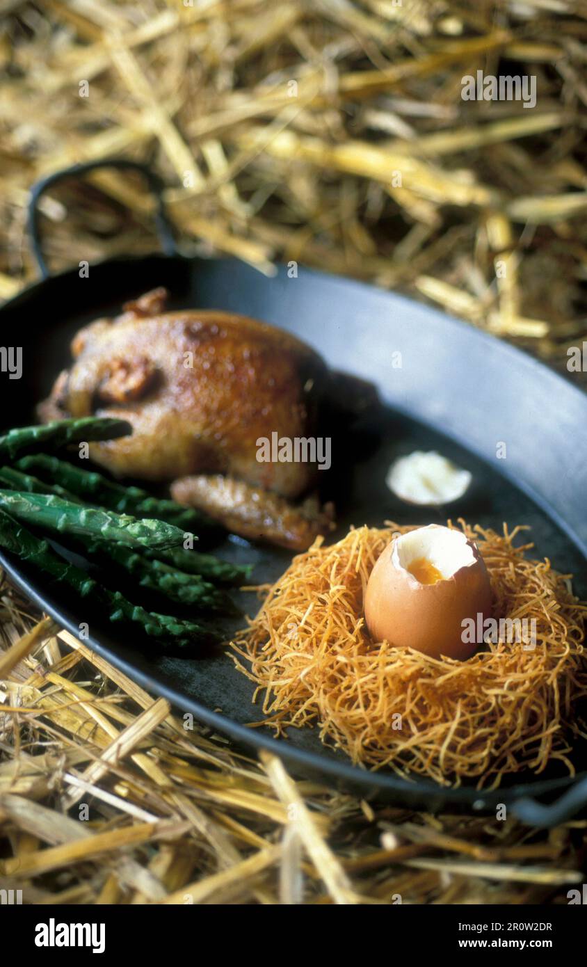 Honey-glazed spring chicken and a soft-boiled egg Stock Photo - Alamy