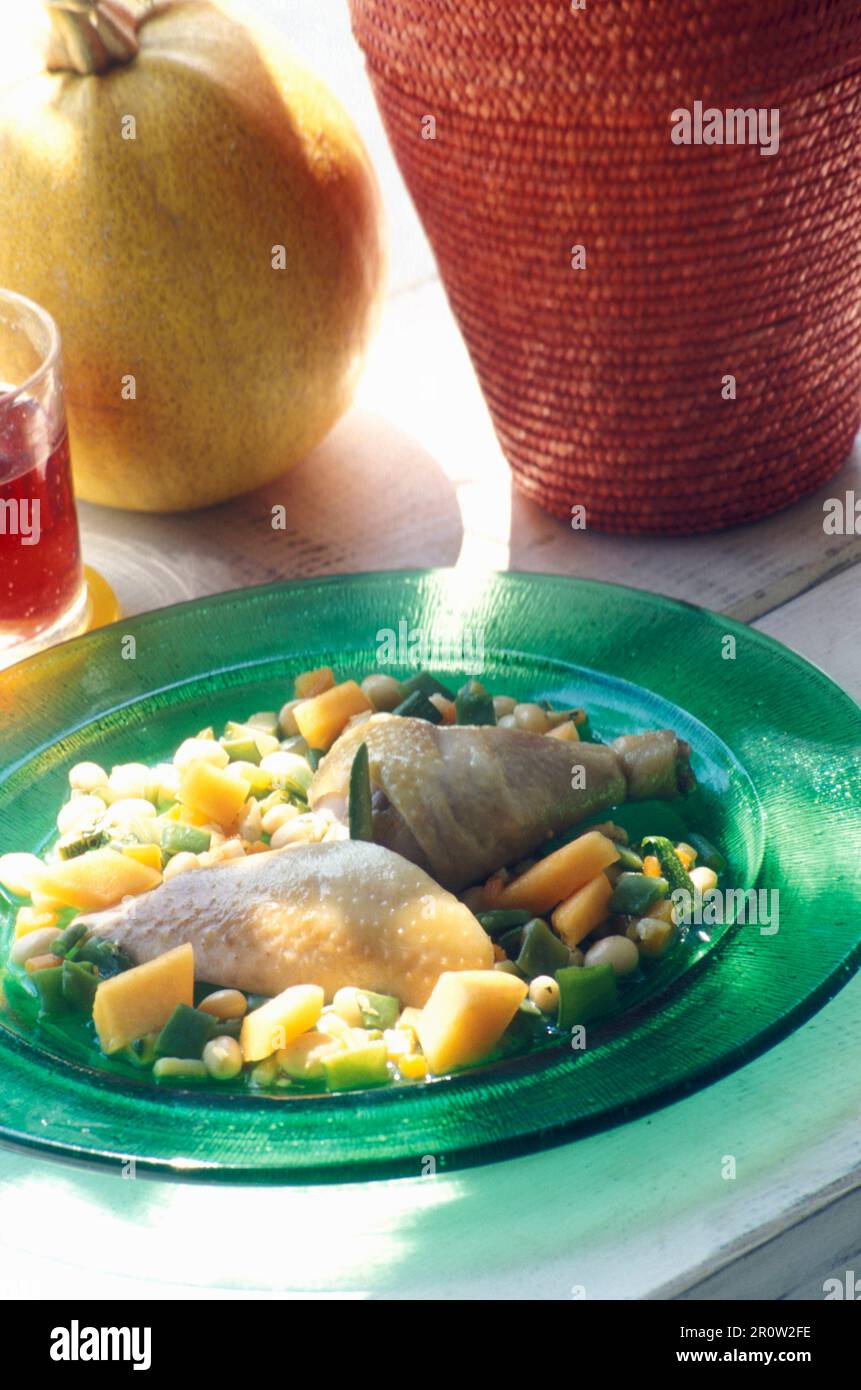 Chicken with Provençal-style melon Stock Photo - Alamy