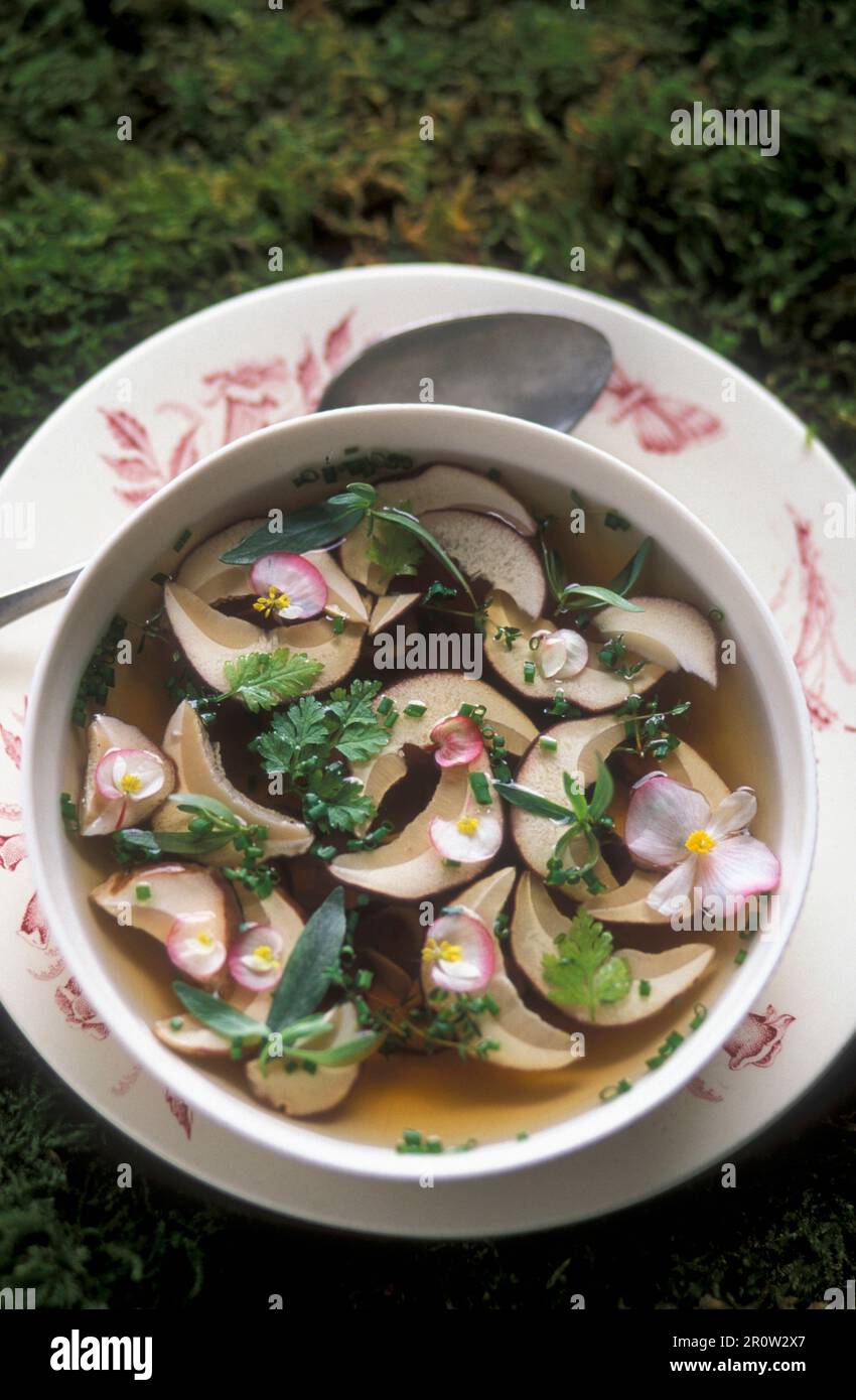 Clear herb soup with porcini mushrooms Stock Photo - Alamy