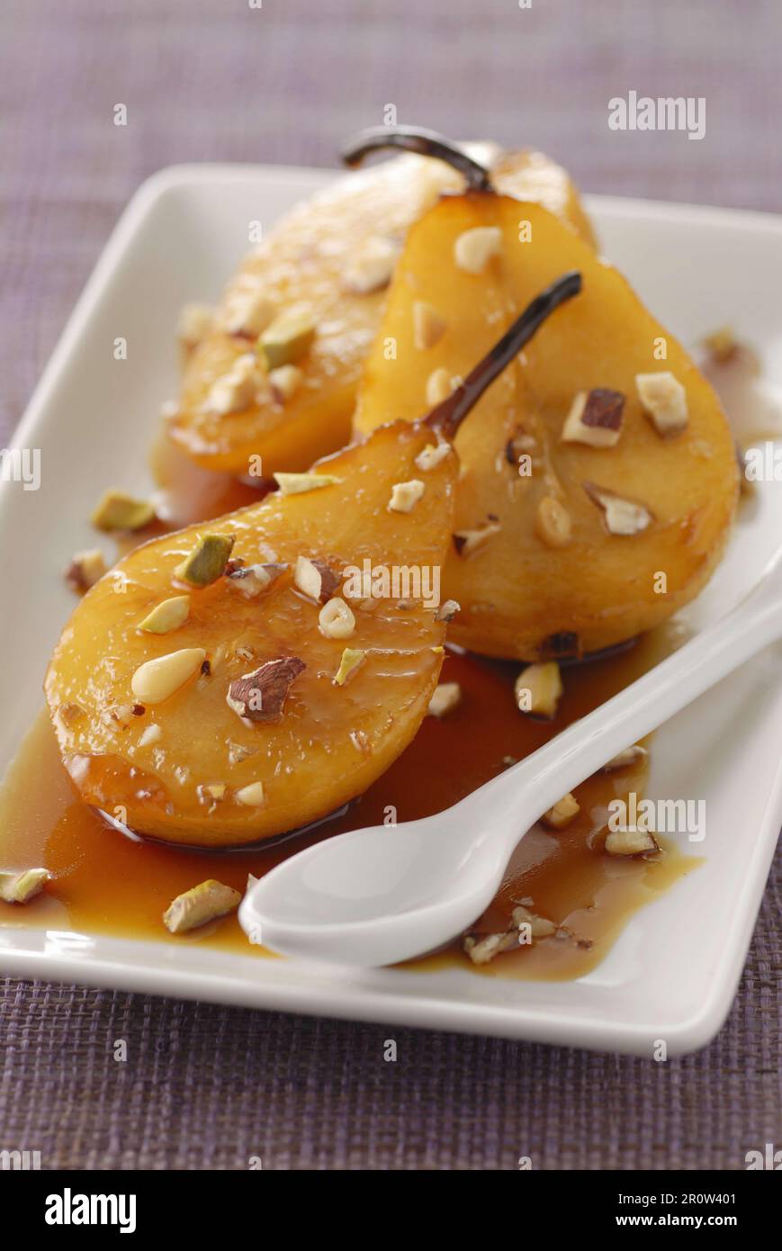 Braised pears with spices and nuts Stock Photo - Alamy