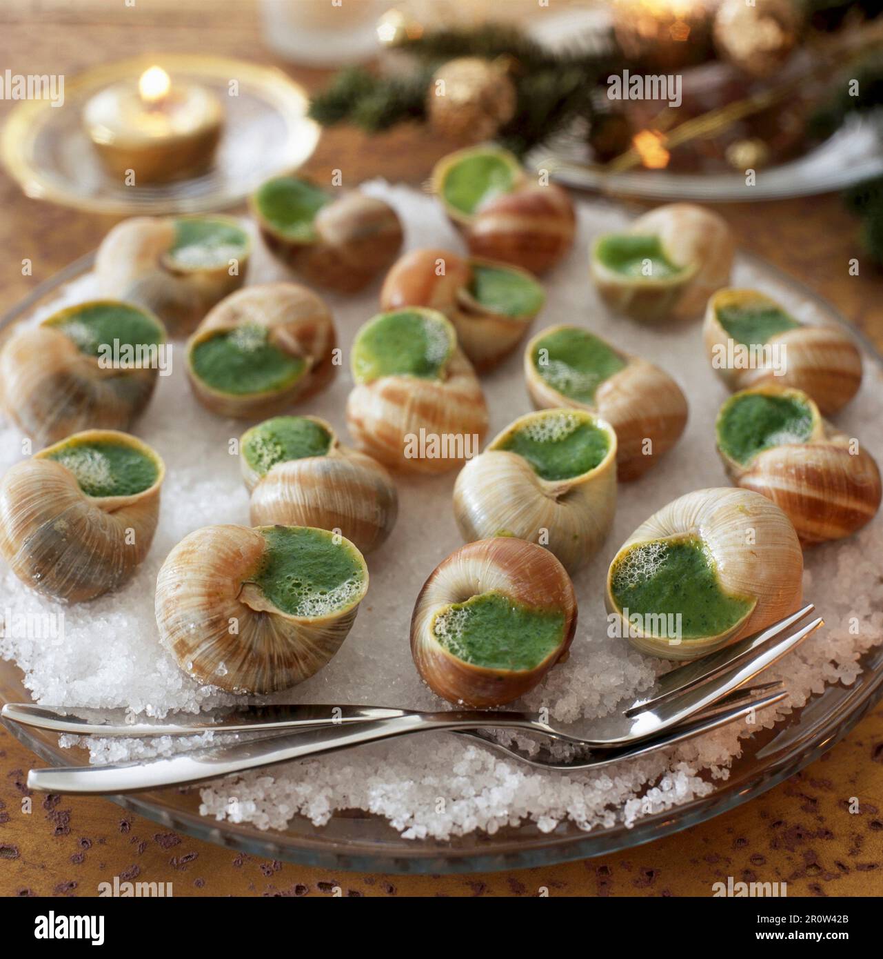 Tray of snails stuffed with parsley butter Stock Photo - Alamy