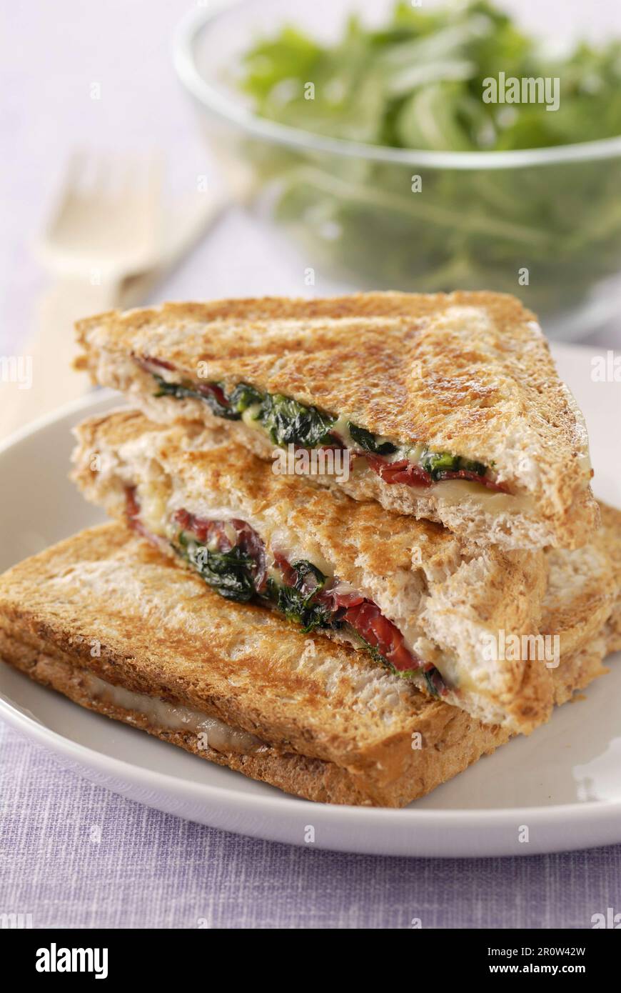 Raclette,spinach and grisons meat toasted sandwich Stock Photo - Alamy
