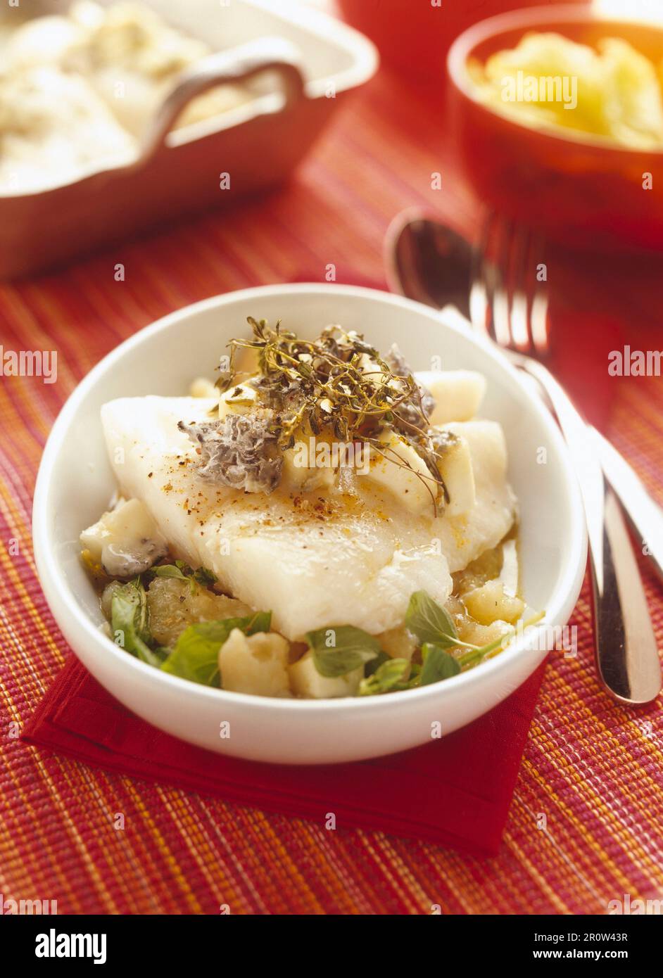 Half-cooked cod with medium-dry goat's cheese and potato and citrus ...