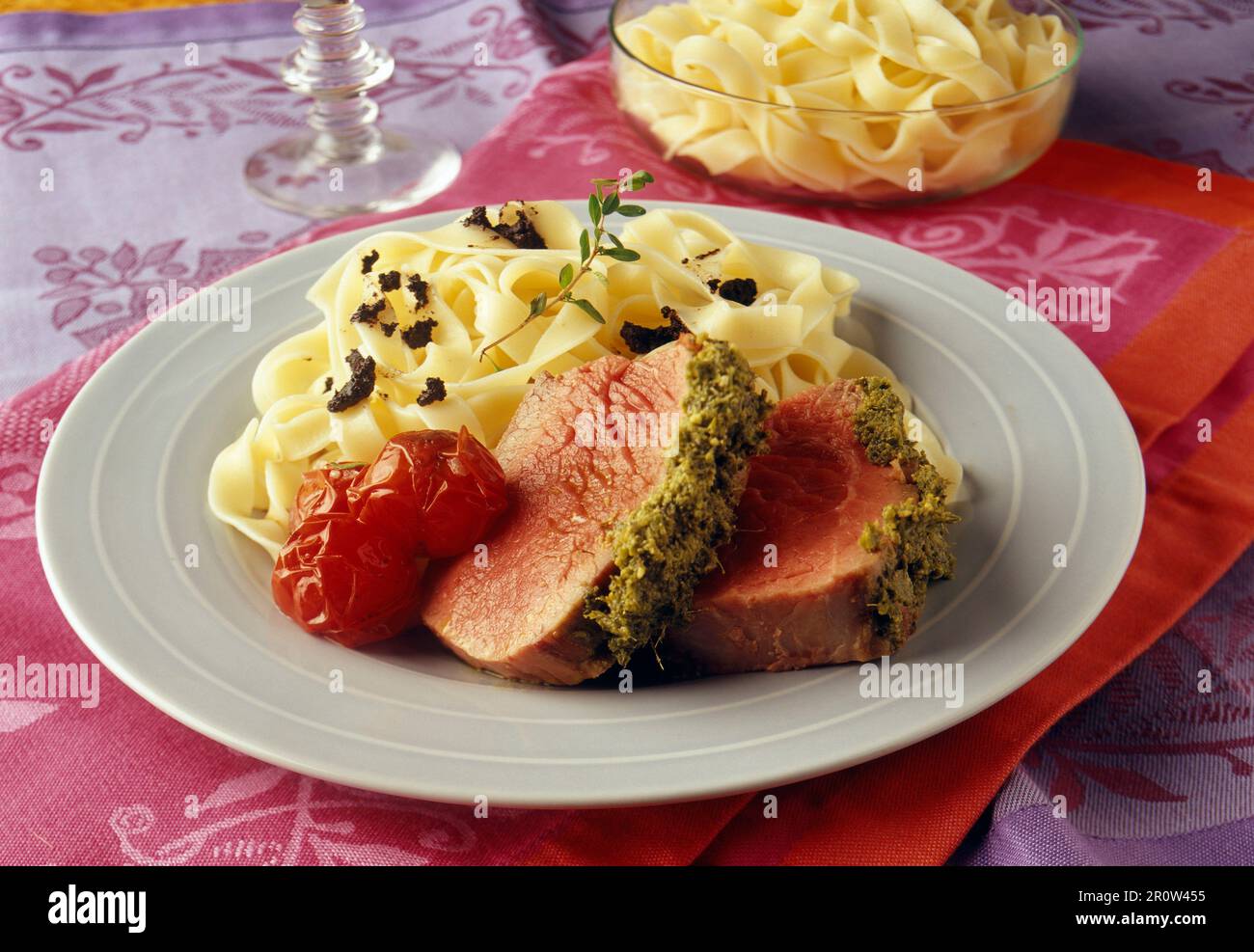 Roast beef covered with grilled pesto and taglatelles with tapenade ...