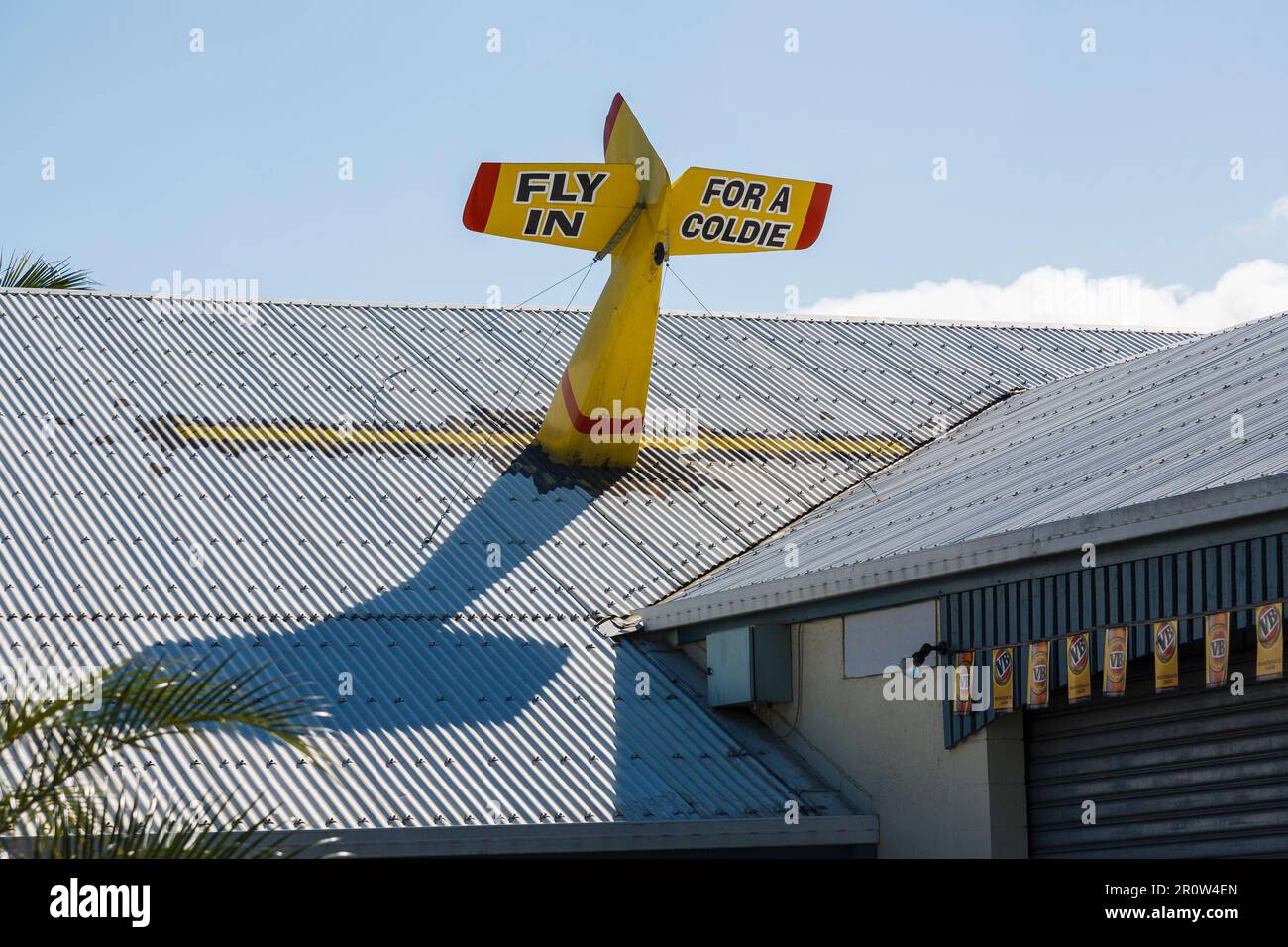 Plane in Queens land Pub roof Stock Photo - Alamy