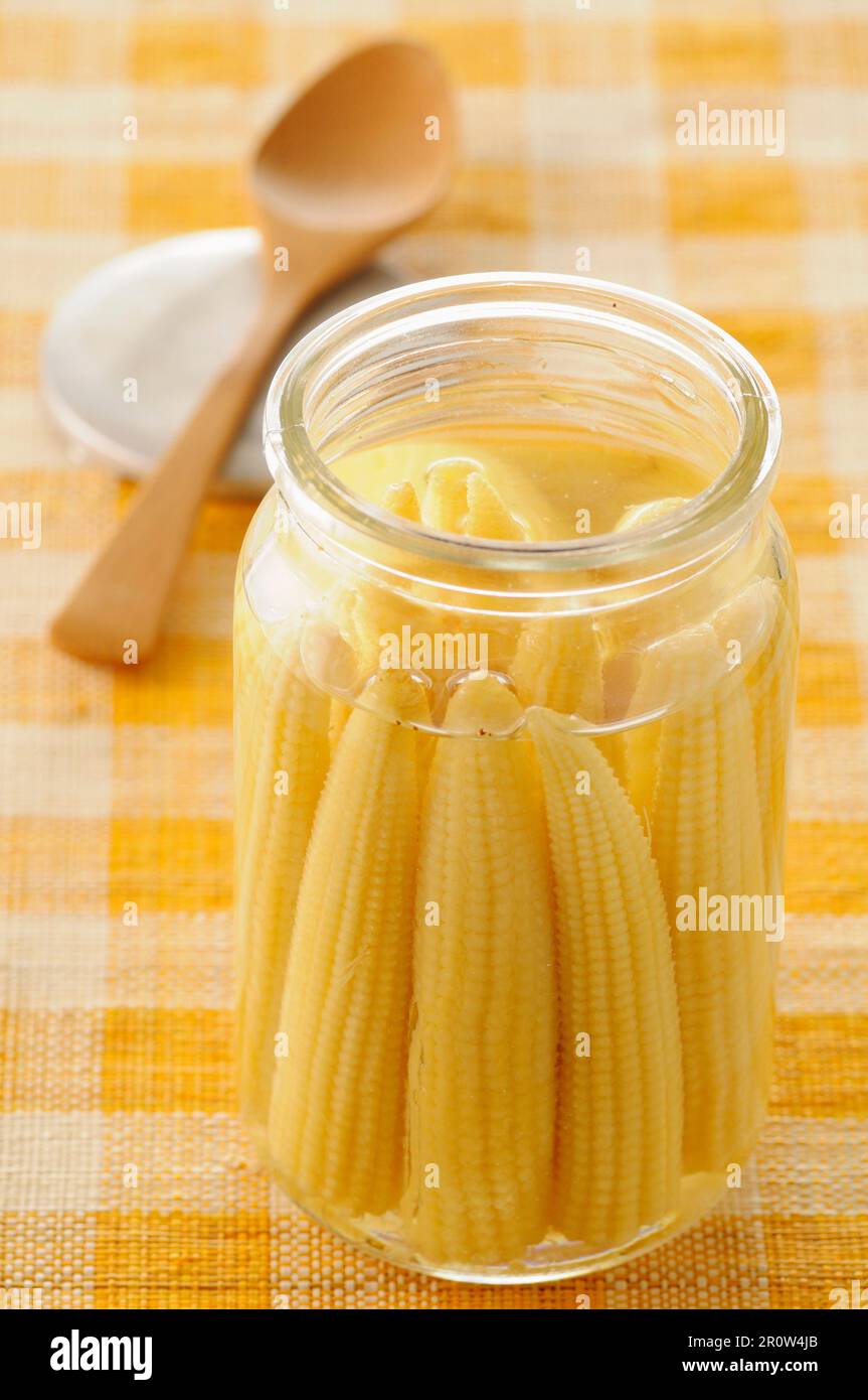 Jar of mini corn on the cobs Stock Photo - Alamy