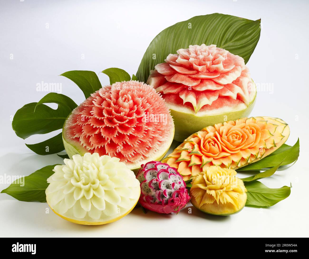 Composition with sculpted exotic fruits Stock Photo - Alamy
