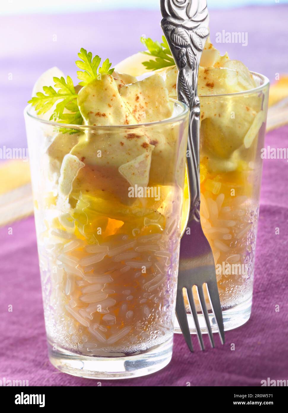 Curried coconut milk monkfish with basmati rice Stock Photo - Alamy