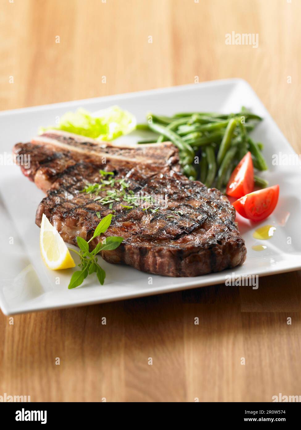 Grilled beef chop Stock Photo - Alamy