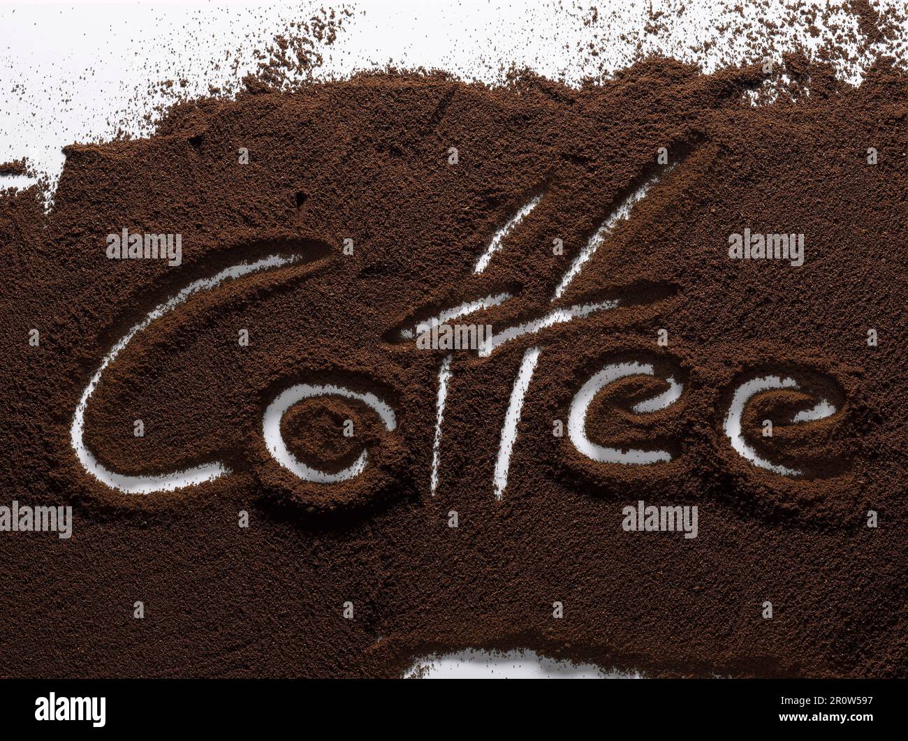 "The word ""coffee"" written in ground coffee Stock Photo - Alamy