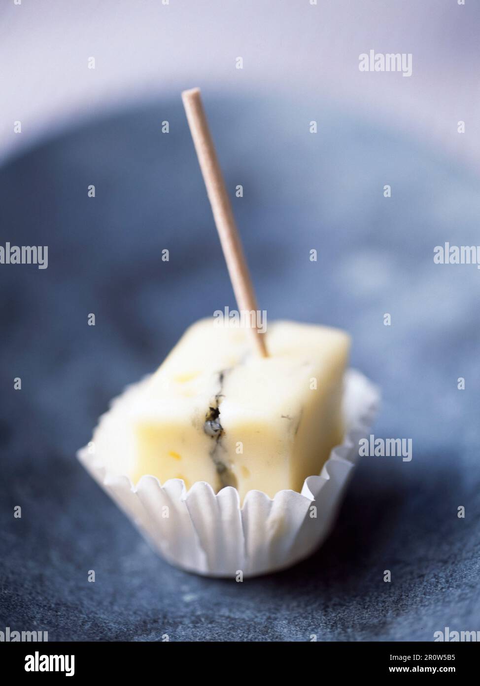 Bite-size piece of Morbier Stock Photo - Alamy