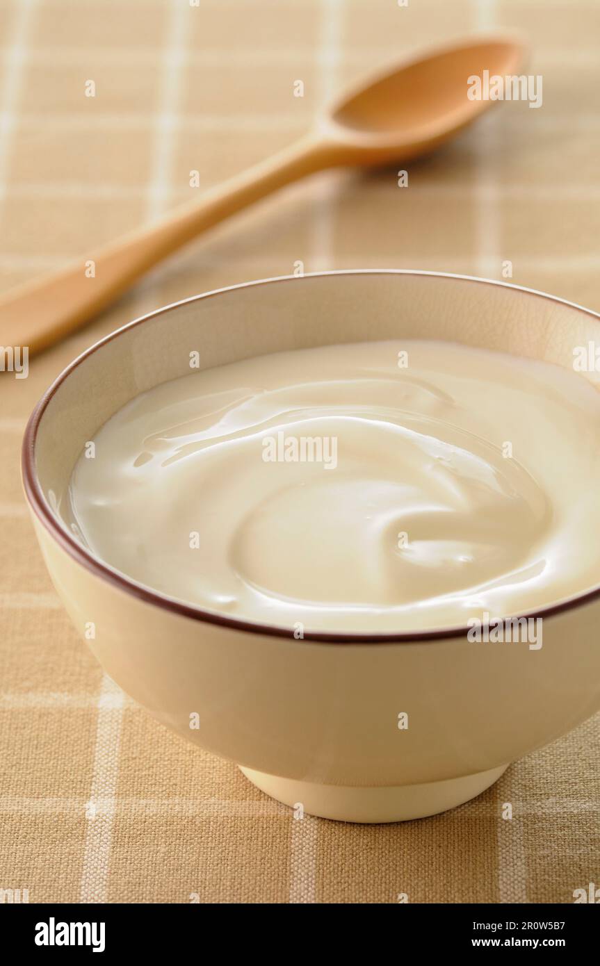 Bowl of cream Stock Photo - Alamy