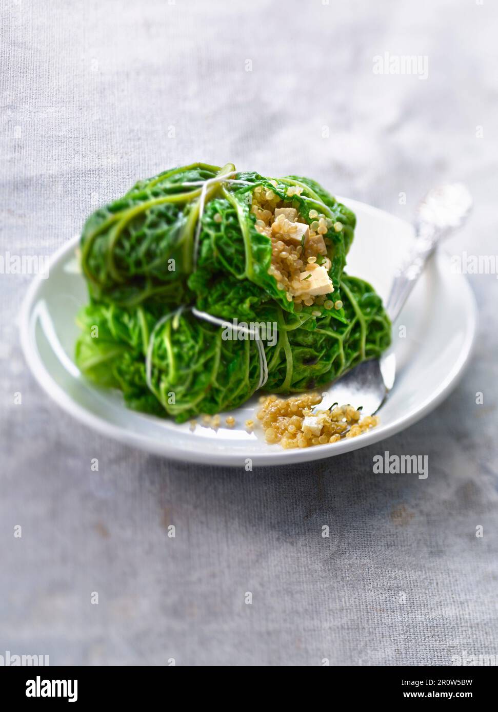 Small cabbages stuffed with tofu and quinoa Stock Photo - Alamy