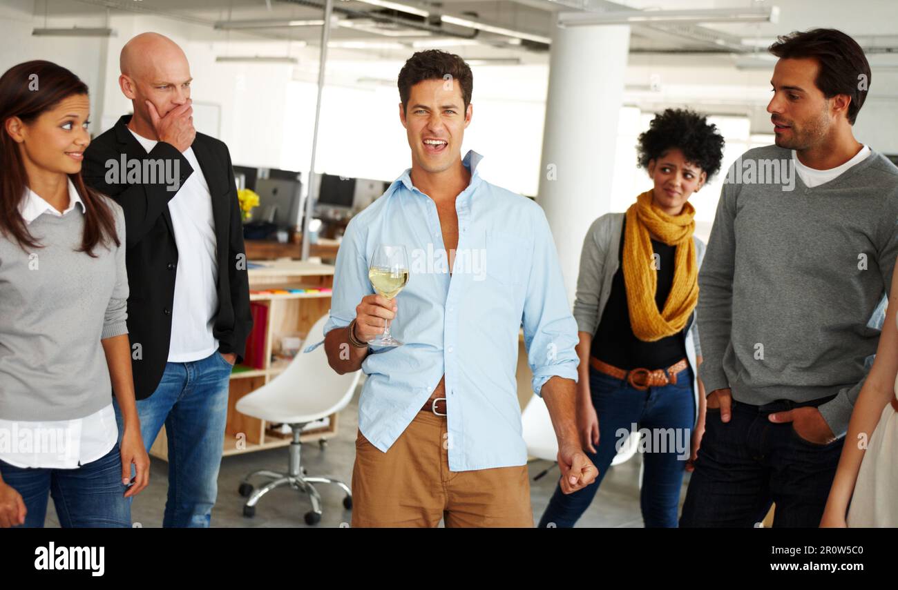 Well at least hes enjoying the office party. A group of coworkers at an ...