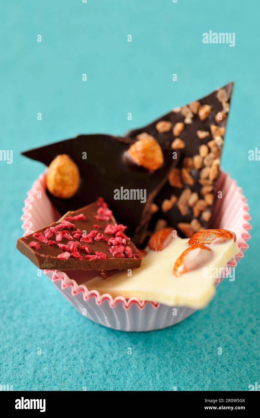 Different flavored pieces of chocolate Stock Photo - Alamy
