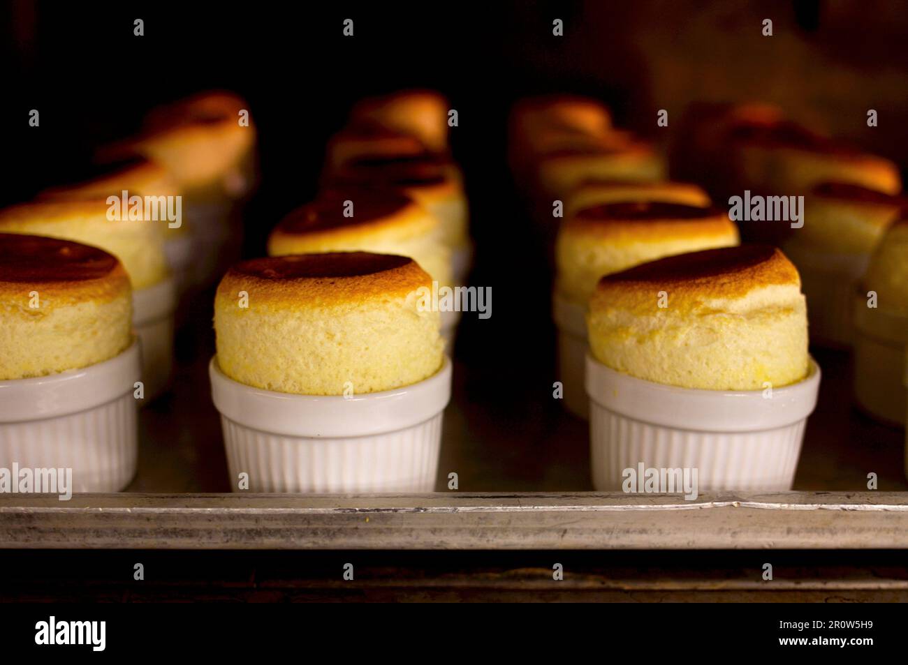 Cooking Grand-Marnier soufflés in the oven Stock Photo - Alamy