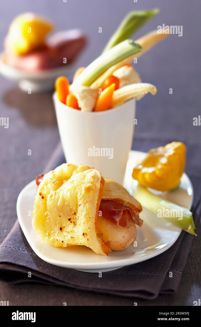 Raclette with crunchy vegetables Stock Photo - Alamy