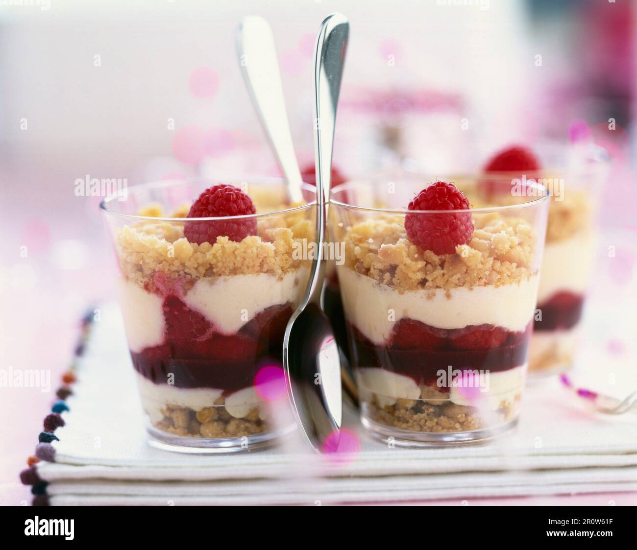 Individual raspberry crumbles Stock Photo - Alamy