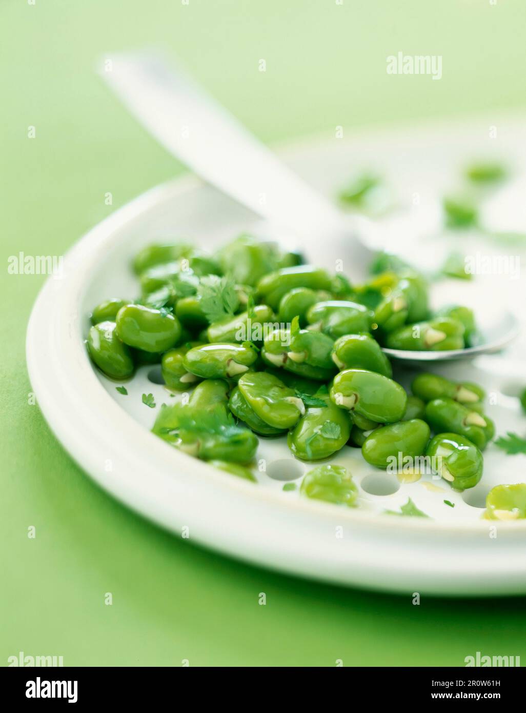 Peeled broad beans Stock Photo - Alamy