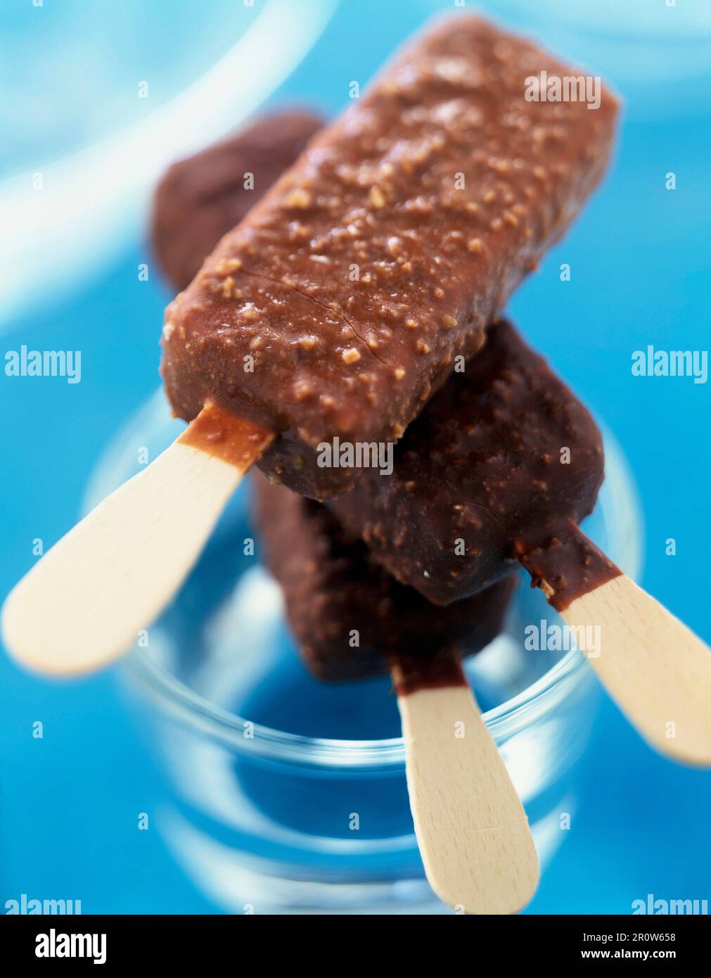 Milk chocolate ice cream lollipops Stock Photo - Alamy