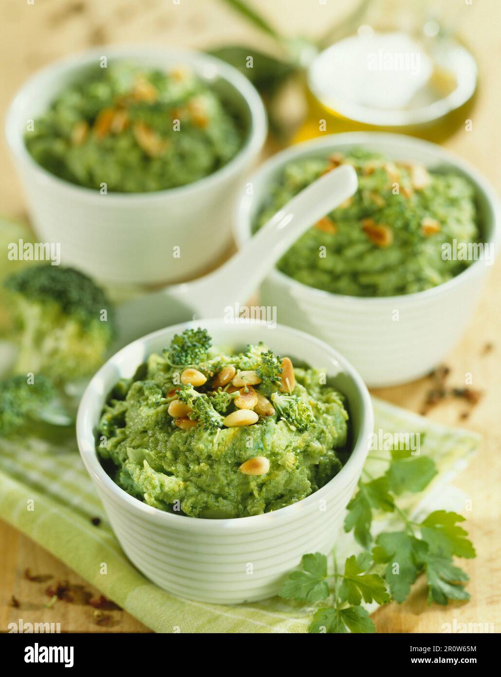 Individual broccoli purees with pine nuts Stock Photo - Alamy