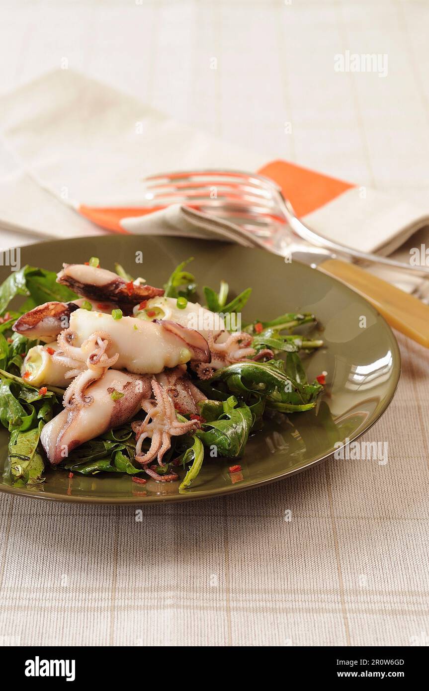 Mini squid stuffed with goat's cheese and potatoes Stock Photo - Alamy