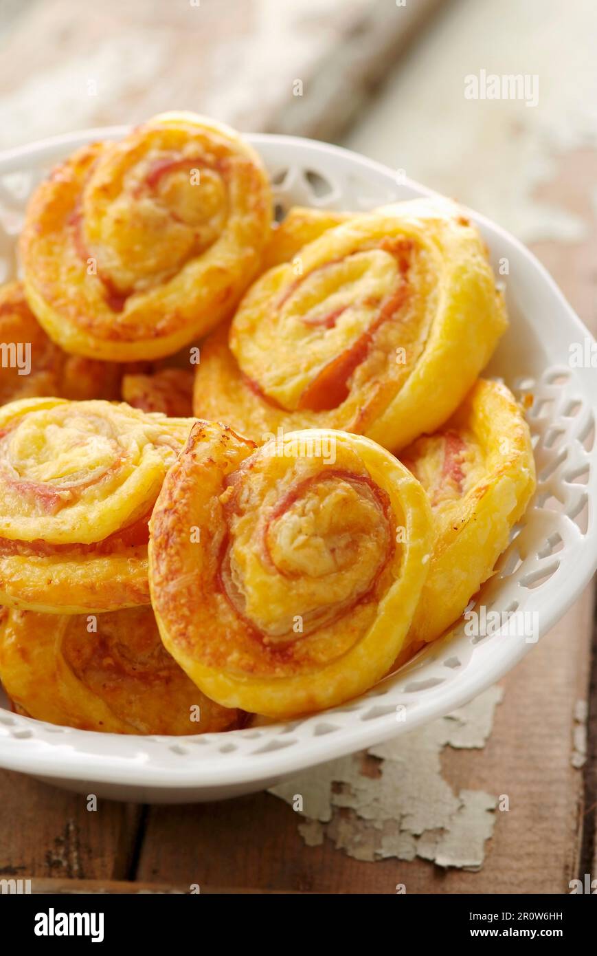 Ham and cheese flaky pastry rolls Stock Photo - Alamy