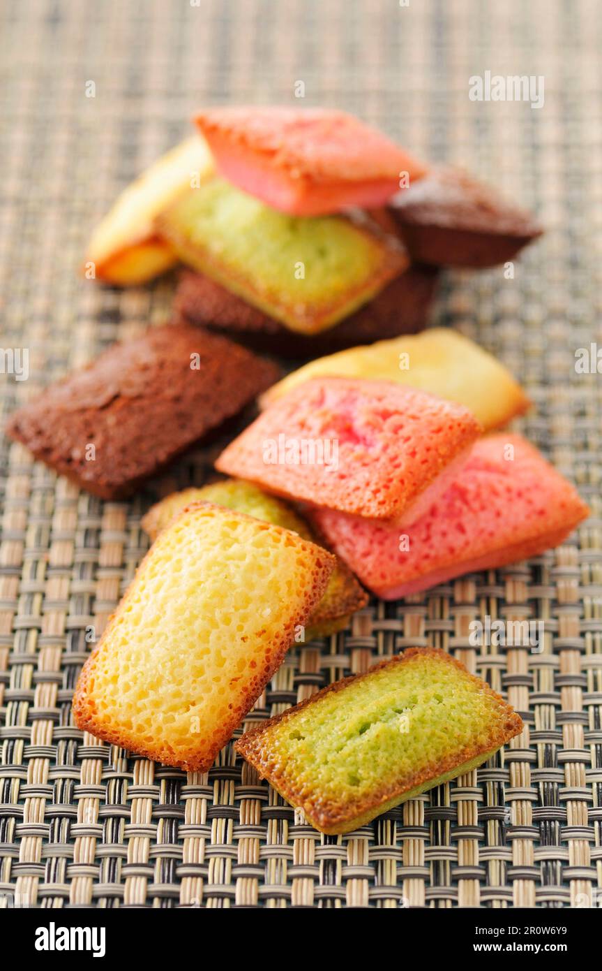 Selection of different-flavored mini Financiers Stock Photo - Alamy