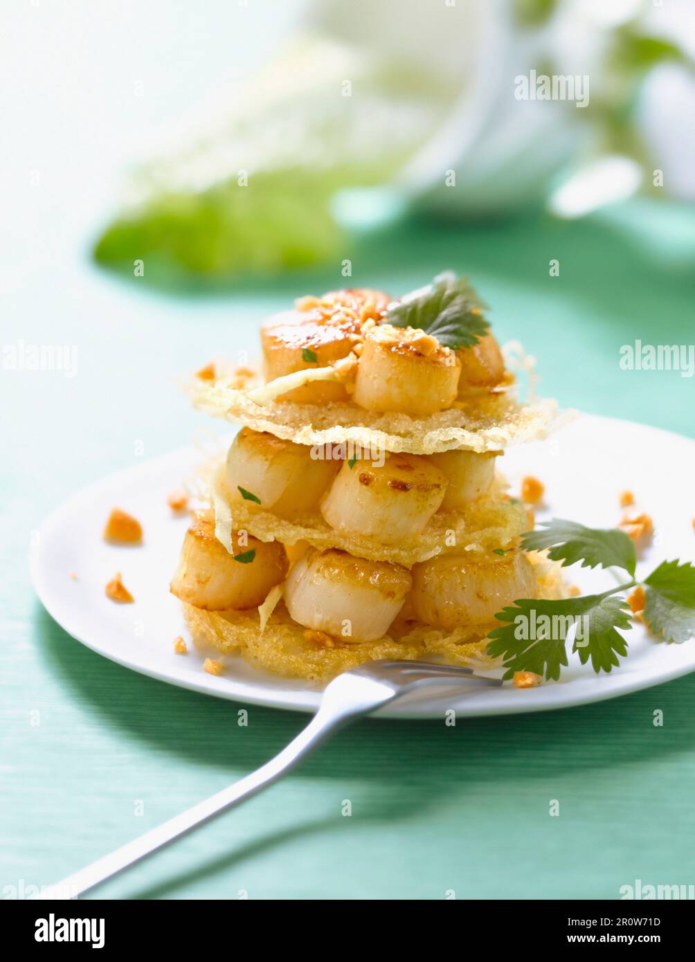 Petoncle scallop and fried noodle savoury Mille-feuille Stock Photo - Alamy