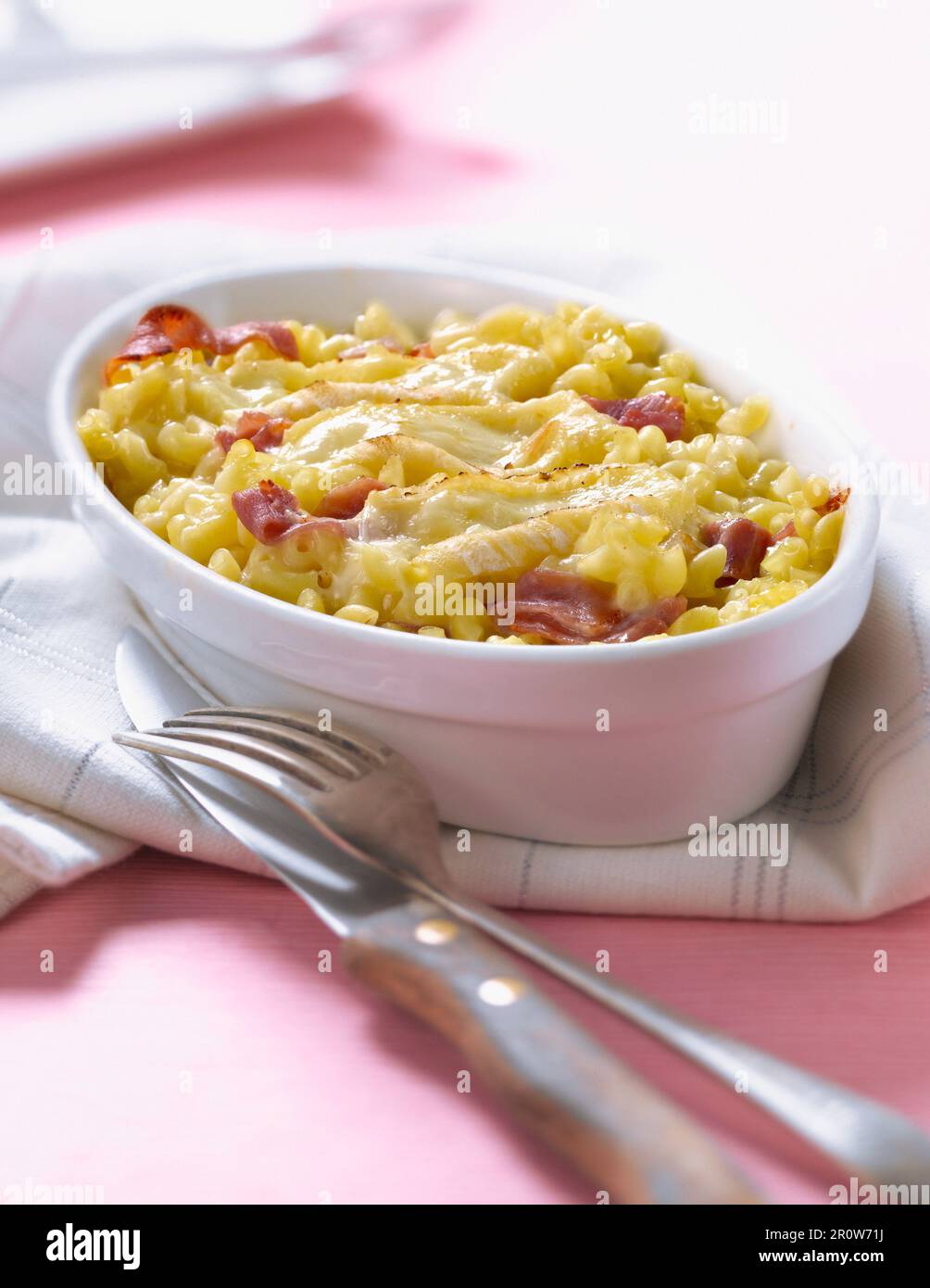 Shell pasta and Reblochon cheese-topped dish Stock Photo - Alamy
