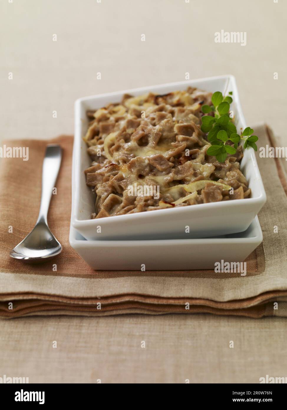 Crozet cheese-topped dish Stock Photo - Alamy