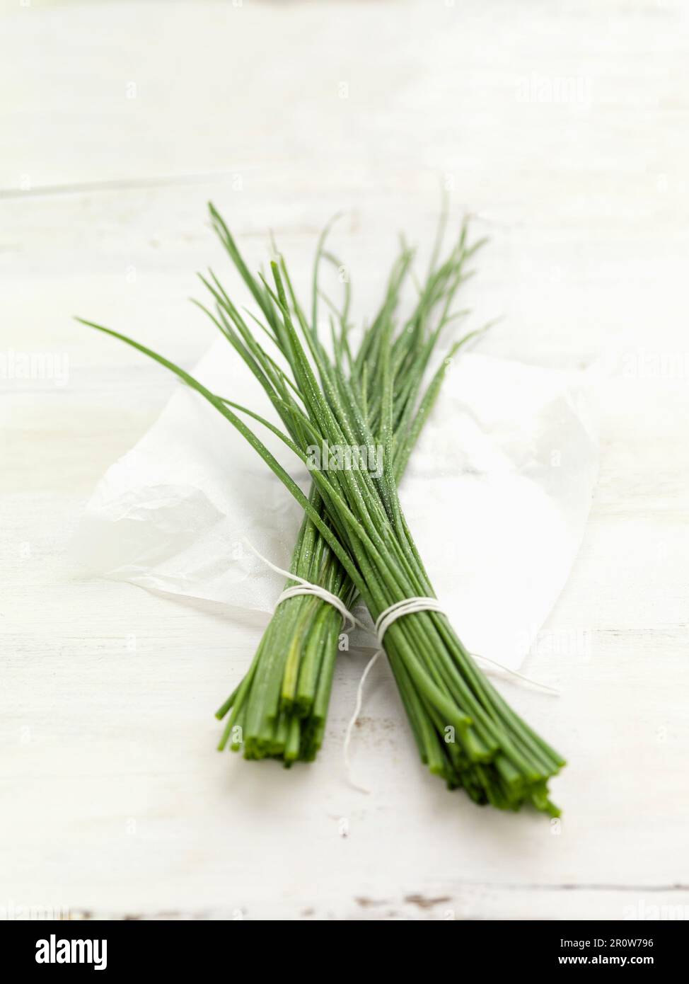 Two bunches of chives Stock Photo - Alamy