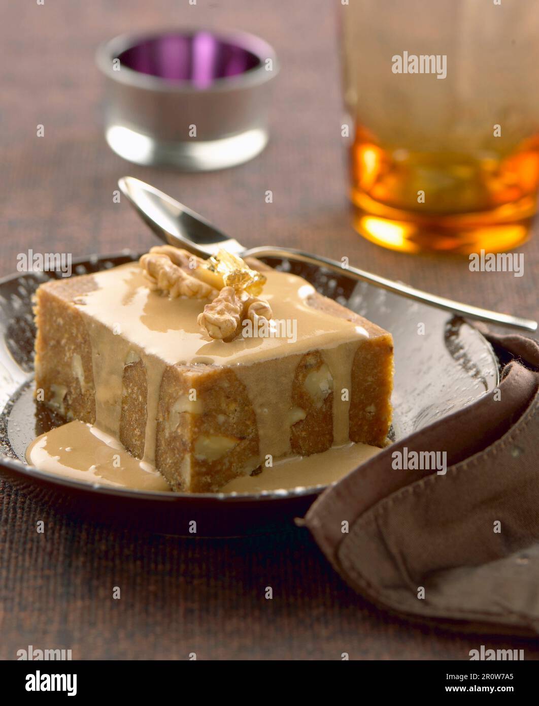 Walnut pudding with sauce Stock Photo - Alamy